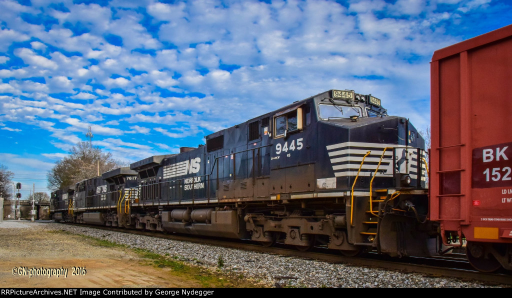 3 engines are leading a mixed freight train